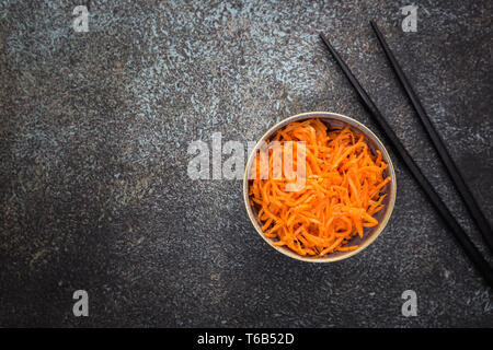 Korean cattot snack salad in the bowl served basil leaves Stock Photo ...