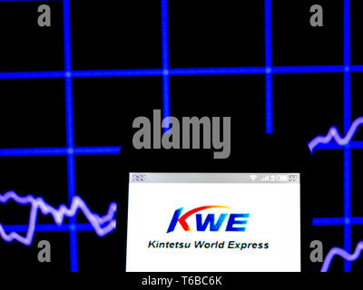 In this photo illustration a Kintetsu World Express, Inc. (KWE) logo ...