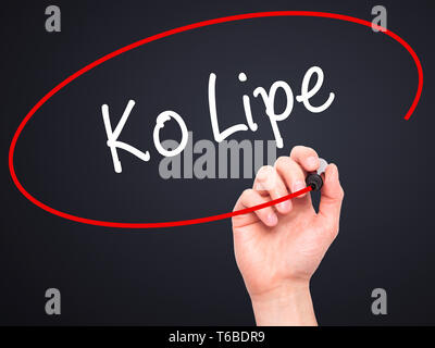 Man Hand writing Ko Lipe with black marker on visual screen. Isolated ...