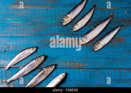 Rustic style. Fish pattern. Herring fish on an old blue wooden ...