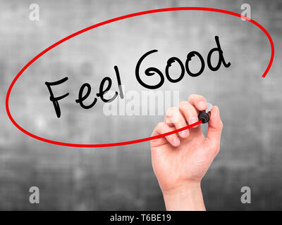 Man Hand writing Feel Good with black marker on visual screen. Isolated ...
