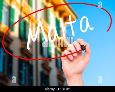 Man Hand writing Malta with black marker on visual screen. Isolated on ...