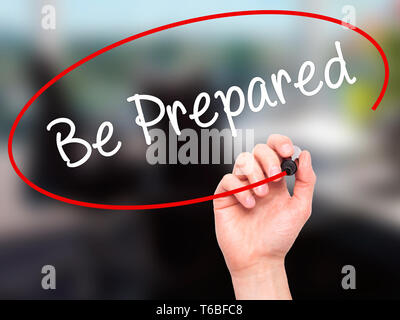 Man Hand writing Be Prepared with black marker on visual screen ...