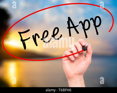 Man Hand writing Free App with black marker on visual screen. Isolated ...