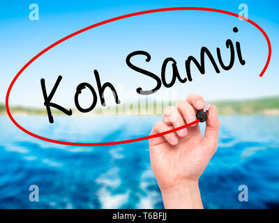 Man Hand writing Koh Samui with black marker on visual screen. Isolated ...