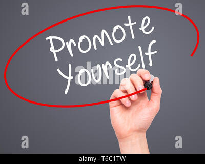 Man Hand writing Promote Yourself with black marker on visual screen ...