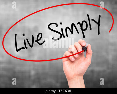 Hand writing sign Simplify Your Life. Word Written on Actions to ...