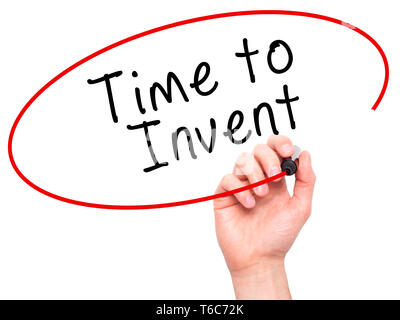 Man Hand writing Time to Invent with black marker on visual screen ...