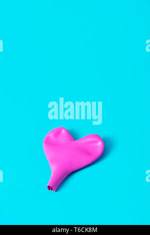 Deflated heart shape balloon Stock Photo - Alamy