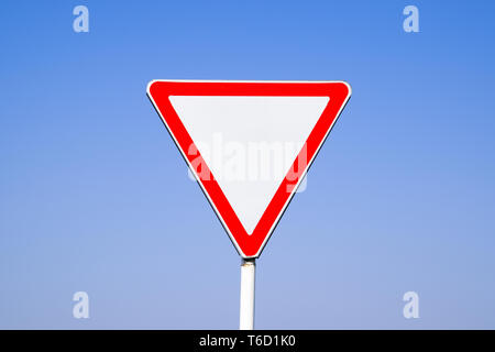 Road traffic signs Give way and Roundabout, Germany Stock Photo - Alamy