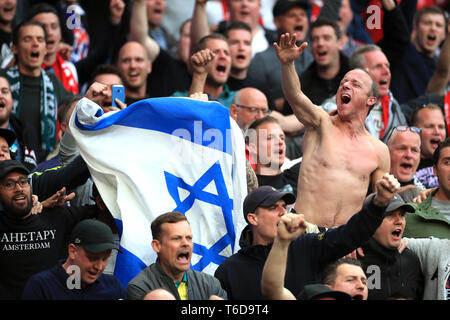 Ajax fans hold a Israel flag in the stands during the Champions League ...