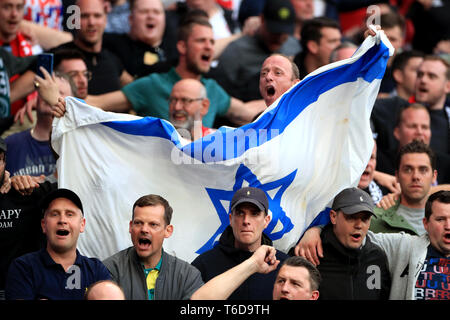 Ajax fans hold a Israel flag in the stands during the Champions League ...