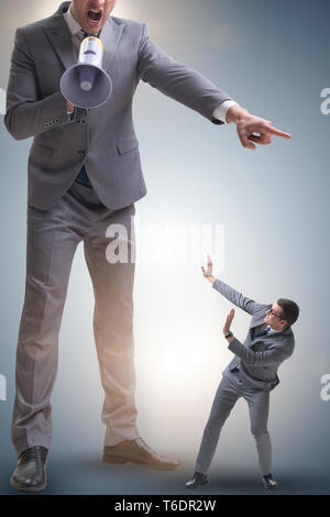 Bad angry boss shouting at employee with loudspeaker Stock Photo - Alamy