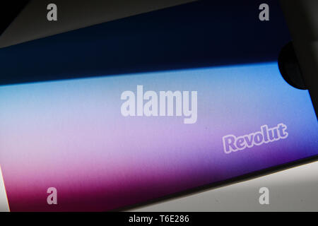 Revolut card packaging in the sun light with the slogan "Beyond Banking ...