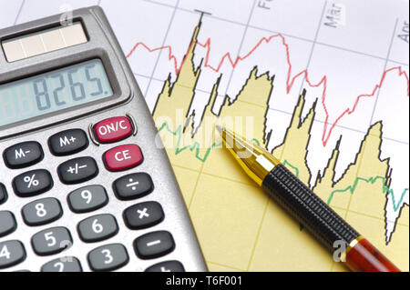 calculator and pencil laying on financial business chart Stock Photo ...