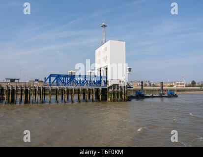 Woolwich Ferry across River Thames with Canary Wharf in background ...