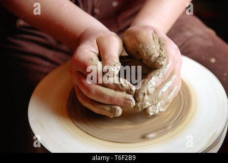 Hands forming clay pot Stock Photo - Alamy
