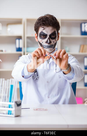 The scary monster doctor working in lab Stock Photo - Alamy