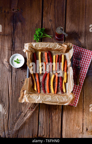 colorful vegetable fries from the oven Stock Photo - Alamy