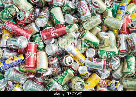 Recycling discarded tin cans at recycling depot Stock Photo - Alamy