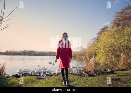 Young Scottish Woman with long red hair looking towards camera Stock ...