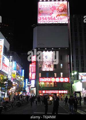 Street scene in Shinjuku district, Tokyo, Japan Stock Photo - Alamy