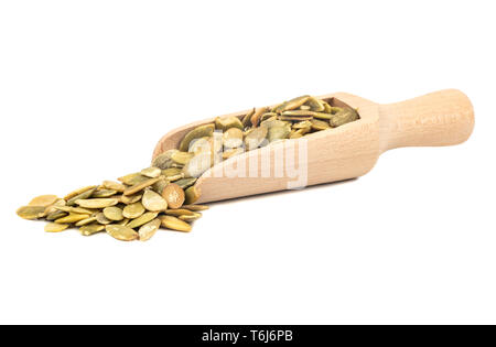 Pumpkin seeds without shell in scoop on white background Stock Photo ...