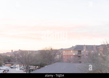 Typical apartment complex with detached garage and covered parking lots ...