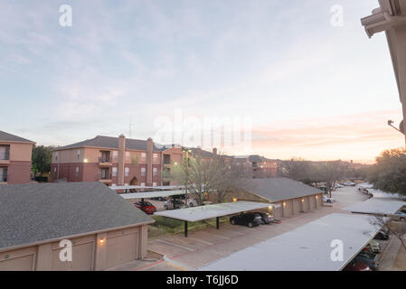 Typical apartment complex with detached garage and covered parking lots ...