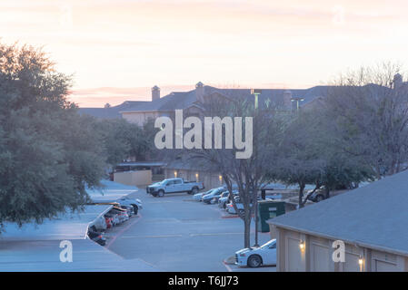 Typical apartment complex with detached garage and covered parking lots ...