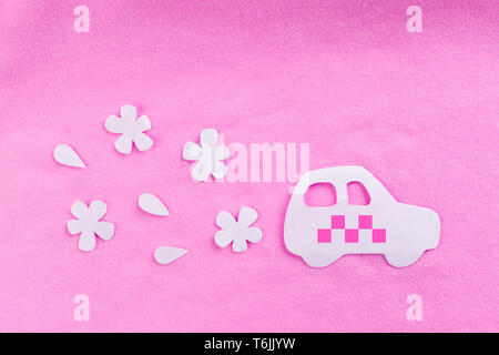 Girl driving car. paper art of a car on pink background Stock Photo - Alamy