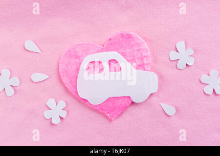 Girl driving car. paper art of a car on pink background Stock Photo - Alamy