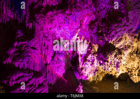 Venetsa Cave in Bulgaria. Beautiful colorful and illuminated cave full ...