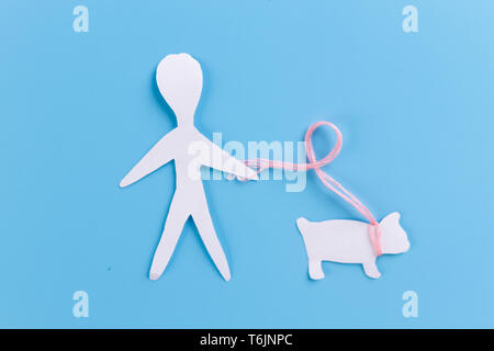 dog with a host. made of paper Stock Photo - Alamy