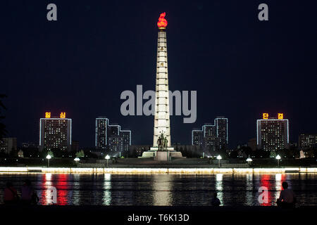 The Juche Tower in Pyongyang, North Korea against a deep blue sky Stock ...