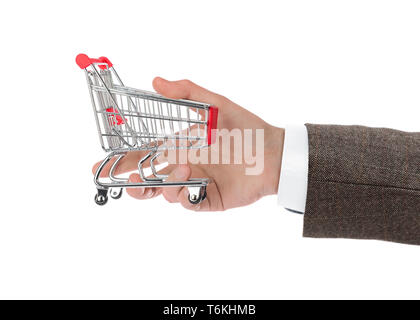 Shopping cart in the hand on white background Stock Photo - Alamy