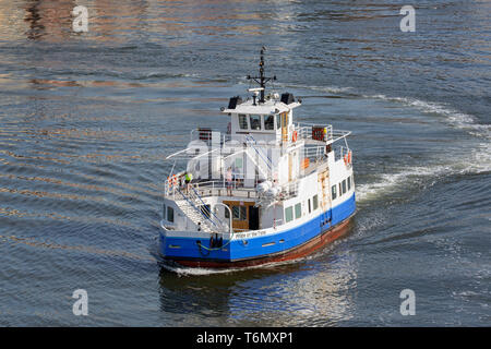 Small ferry boat crossing River Deben between Bawdsey Quay and ...