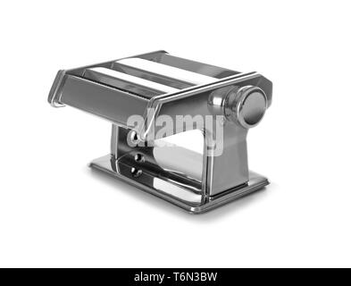 Modern pasta maker machine and tagliatelle isolated on white Stock ...