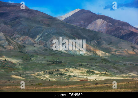 Different colored mountains Stock Photo - Alamy