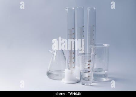 Different laboratory glassware on grey background, space for text Stock ...