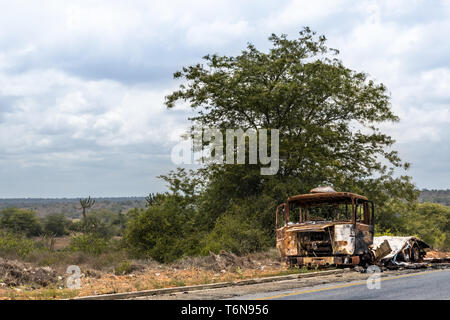 Bengo Province in Angola. Abandoned cars at the road. Africa in hands ...