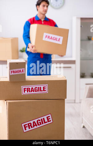The transportation contractor with fragile boxes Stock Photo - Alamy