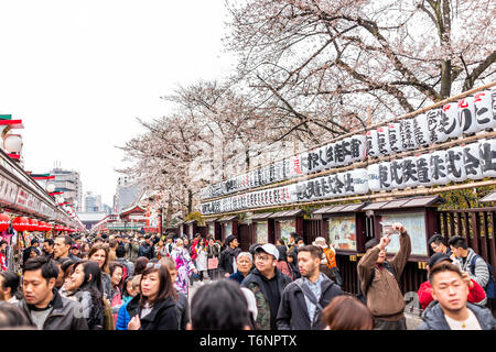 People visit Sensoji temple on New Year's Eve in Tokyo Thursday, Dec ...