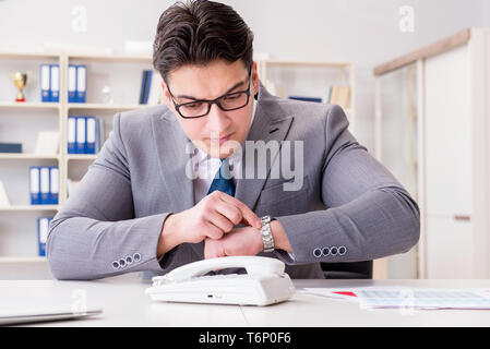 Businessman expecting important call on phone Stock Photo - Alamy