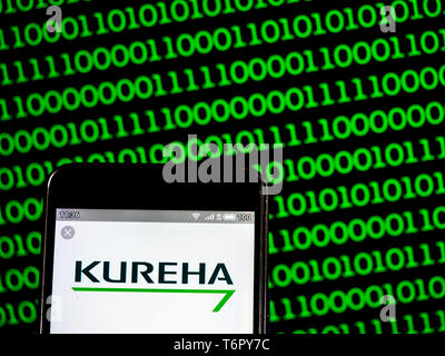 In this photo illustration a Kureha Corporation logo seen displayed on ...