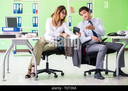 The two financial specialists working in the office Stock Photo - Alamy