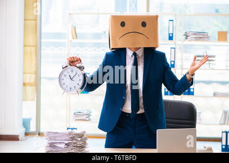 Unhappy man with box instead of his head Stock Photo - Alamy