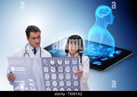 Two doctors in telemedicine concept Stock Photo - Alamy