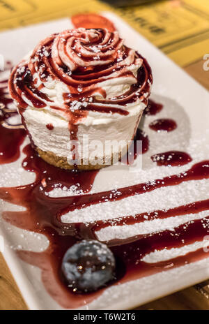 Delicious round pink and white cheesecake lactose-free, sugar-free ...