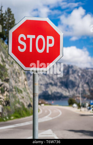 Red Stop sign in Montenegro Stock Photo - Alamy